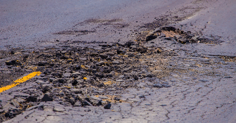 How Damaged Asphalt Leads to Damaged Vehicles - Bennett Paving